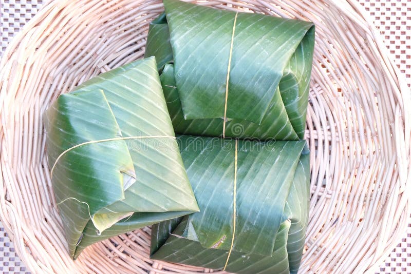 Sticky Rice Wrapped in Banana Leaves Stock Image - Image of cooked ...