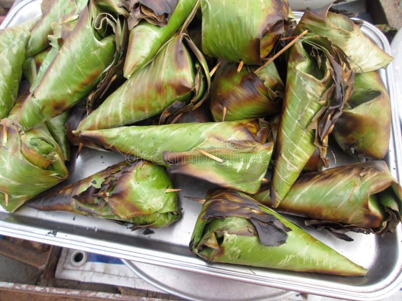 Sticky rice wrapped stock photo. Image of asian, grilled - 44995796