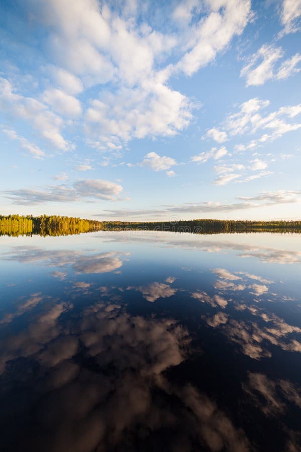Still Lake Perfect Reflection of Sky and Clouds Stock Image - Image of ...