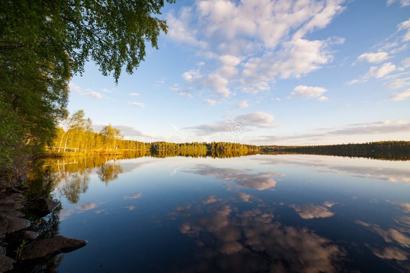 Still Lake Perfect Reflection of Sky and Clouds Stock Photo - Image of ...
