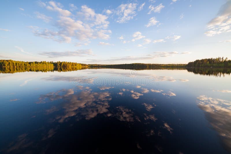 Still Lake Perfect Reflection of Sky and Clouds Stock Photo - Image of ...