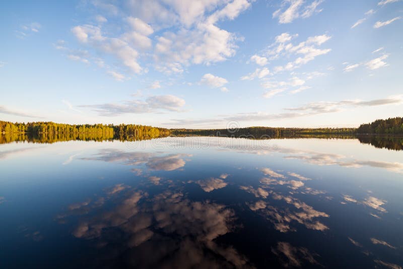 Still Lake Perfect Reflection of Sky and Clouds Stock Image - Image of ...