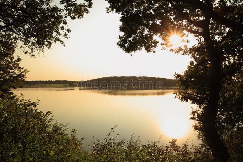 Still lake at sunset stock photo. Image of rural, countries - 26243930