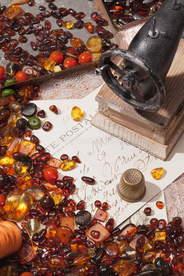 Still-life with Amber and Sewing Machines. Stock Photo - Image of ...