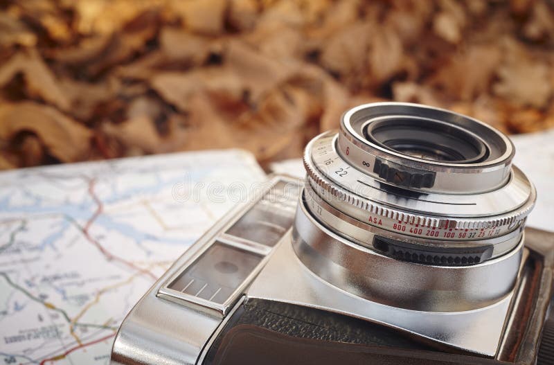 Still Life in the Autumn Forest with Camera and Map Stock Image - Image ...