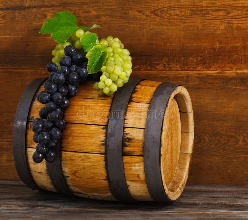 Still Life with Barrel Decorated Red and White Grapes Stock Image ...