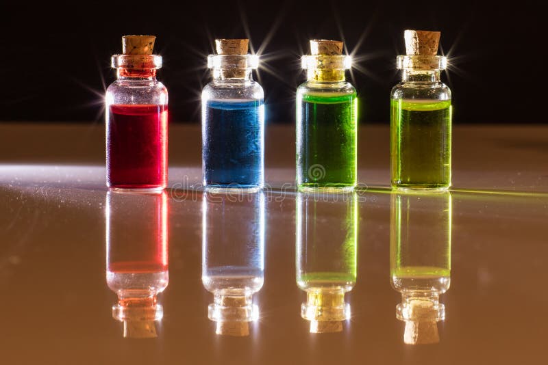 Bottles colours stock photo. Image of liquid, bottles - 104845984