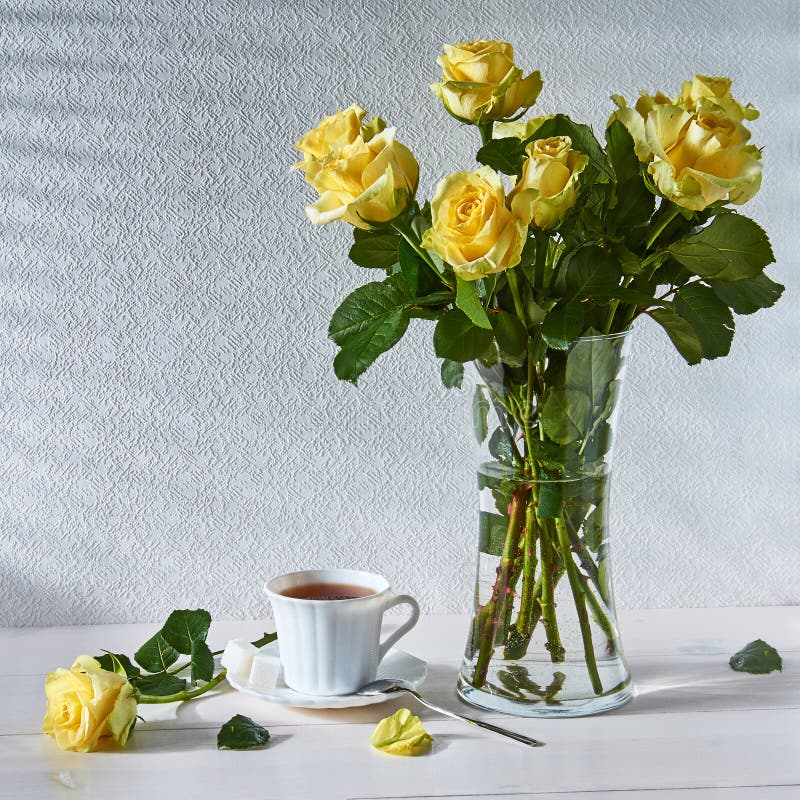 Yellow Roses and a Cup of Hot Drink Stock Photo - Image of beauty ...
