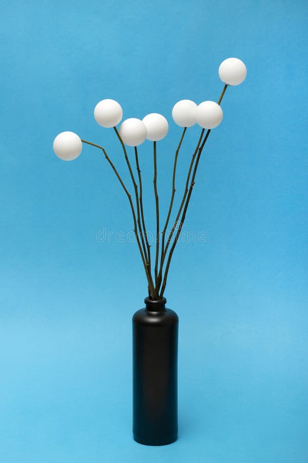 Still Life with a Bouquet of White Balls on a Blue Background Stock ...