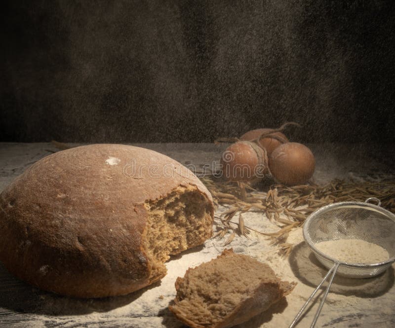 Still Life Bread from the Oven on the Table with Flour. Stock Image ...