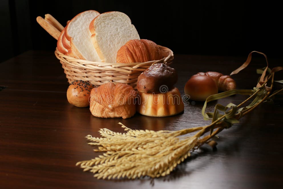 A Still Life with Breads and Wheats Stock Photo - Image of loaf, brown ...