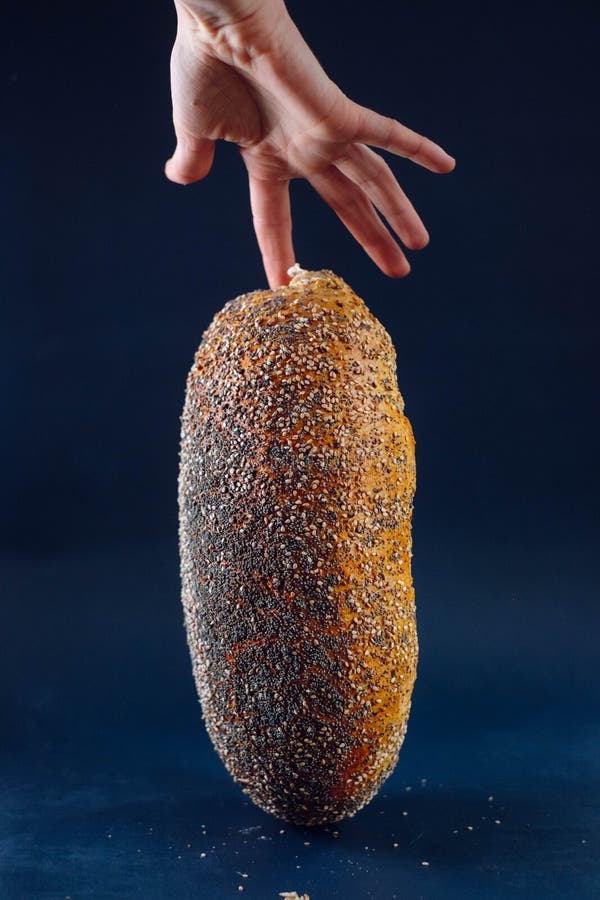 Slim Brown Bread with Seeds Stock Photo - Image of dinner, finger: 99127286