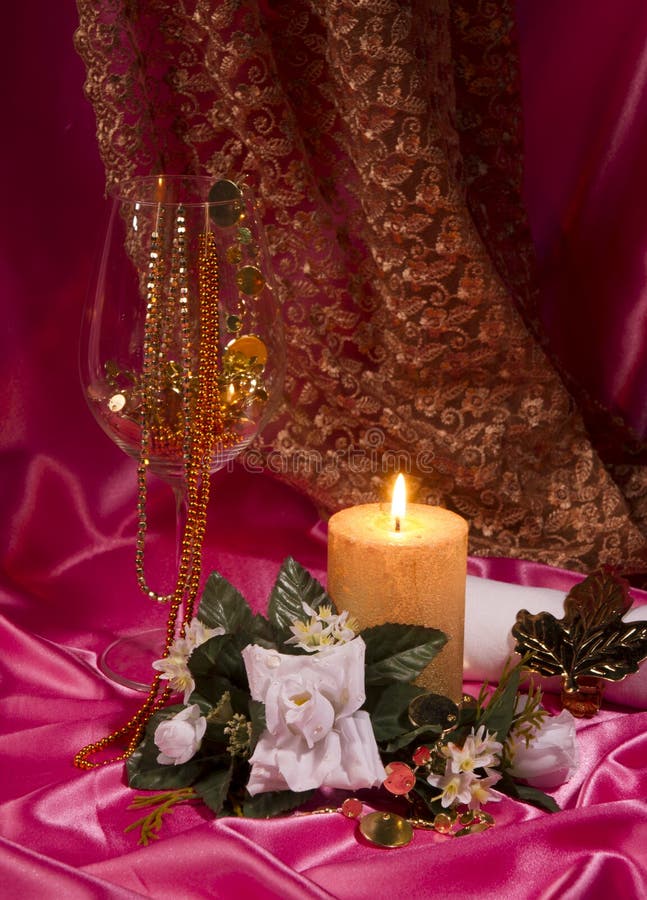 Still Life with Candle, Glass and Flowers Stock Image - Image of beads ...