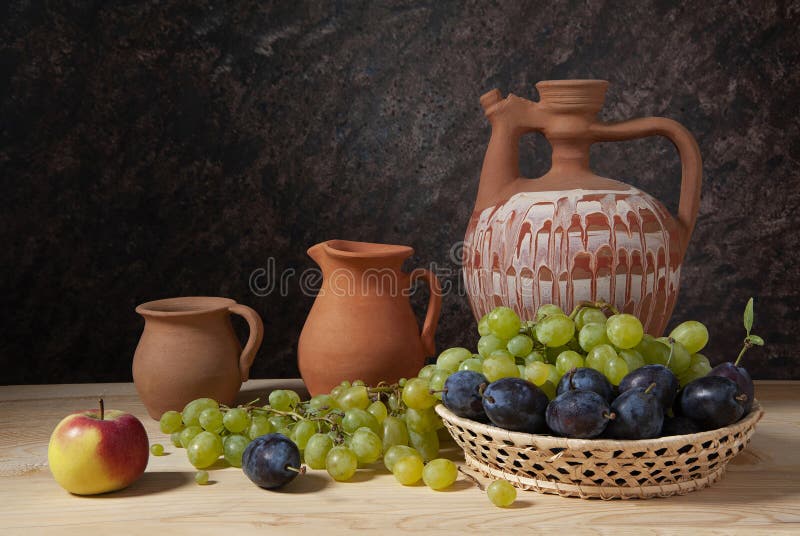 Still Life, Ceramic Dishes, Wicker Basket and Various Fruits Stock ...