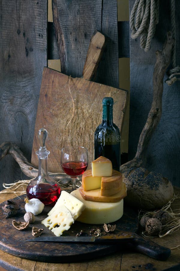 Still life with cheese stock image. Image of knife, beverage - 20280277