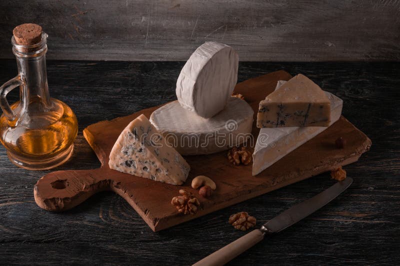 Still life with cheese. stock photo. Image of cheese - 128589480