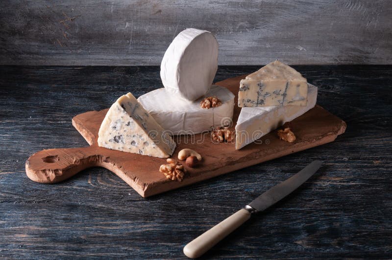 Still life with cheese. stock image. Image of fastfood - 128590117