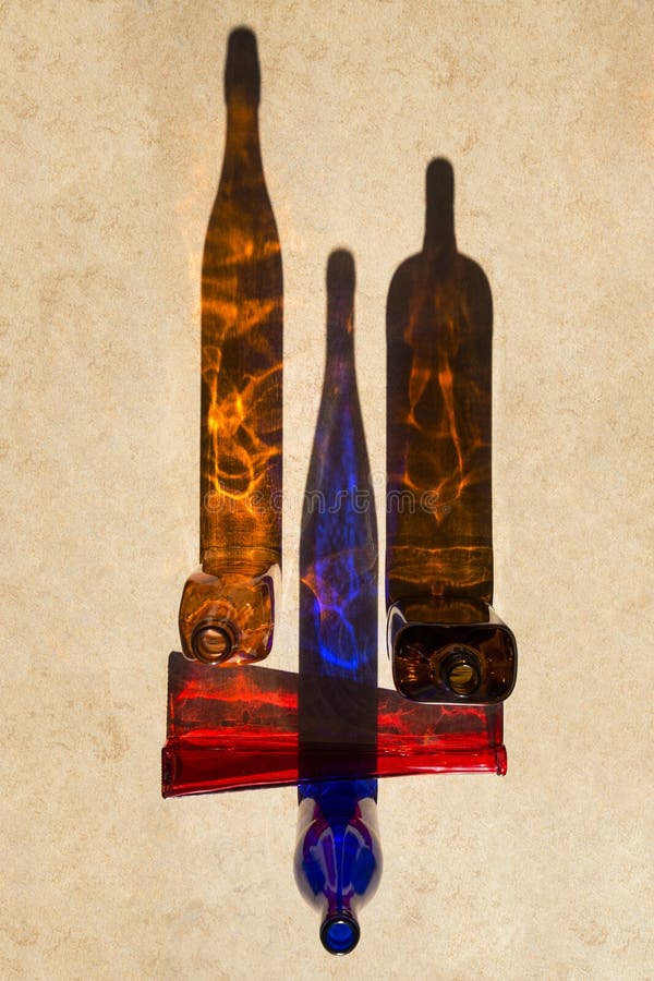 Still Life with Colored Bottles and Shade from Sunlight Stock Photo ...