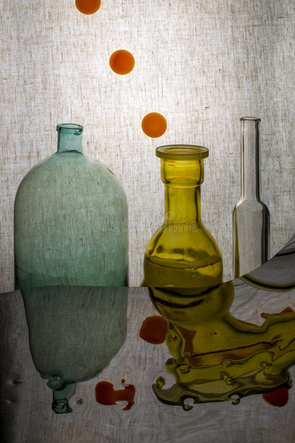 Still Life with Colored Glass Bottles and a Jar Stock Image - Image of ...