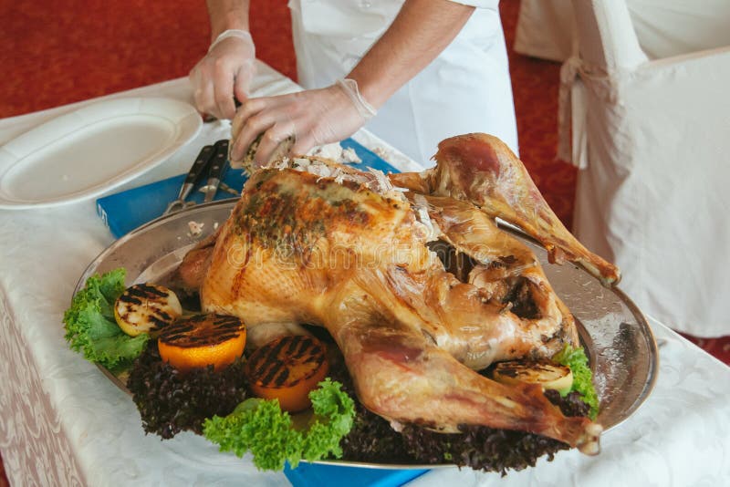 The Cook Cuts the Fried Turkey Stock Photo - Image of christmas ...