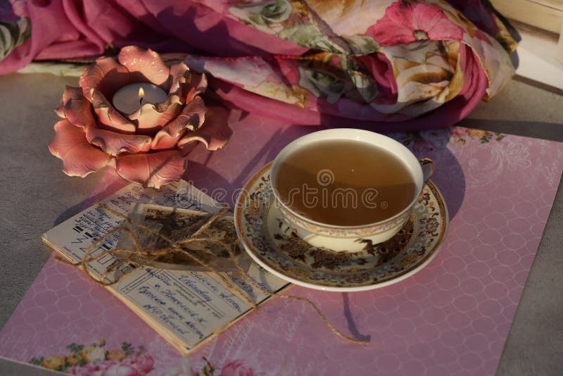 Still Life with Cup of Tea, Candle and Cards Stock Photo - Image of ...