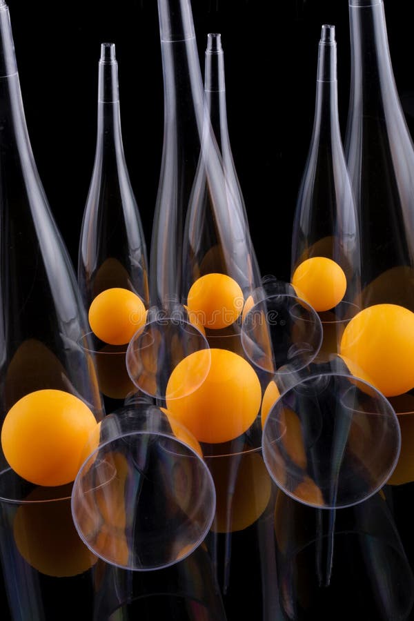 Still Life with Double Exposure with Orange Balls and Glass Figures ...