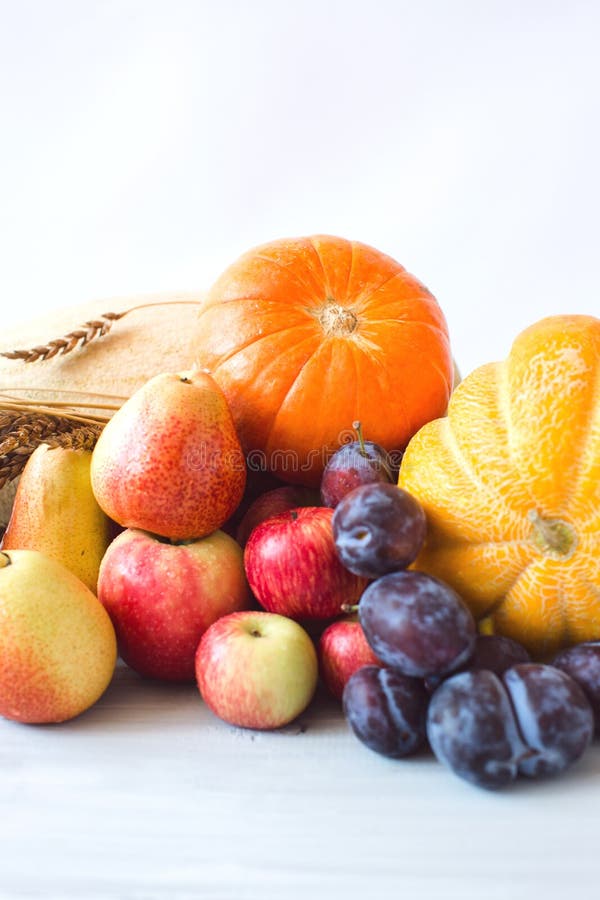 Still Life of Fresh Fruit in a Wicker Basket and Wheat Stock Image ...