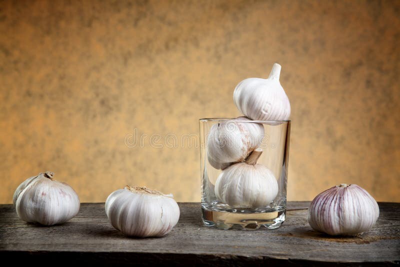 Still-life with Garlic and a Glass on Table Stock Image - Image of life ...