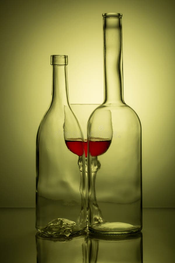 Still Life with Glass Bottles and Wine Glass Stock Photo - Image of ...