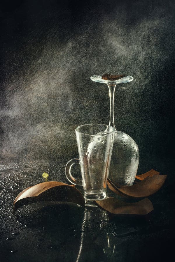 Still Life with Glass Objects, a Broken Vase and Water Splashes Stock ...