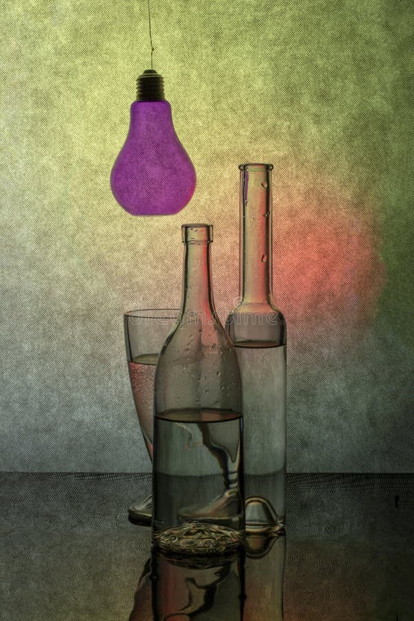 Still Life with Glassware with Liquid and a Light Bulb Stock ...