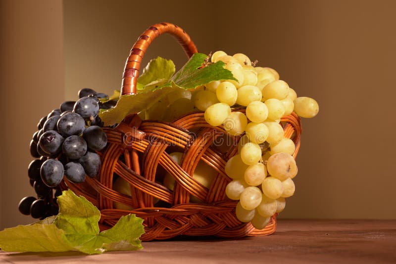 Still life grape in basket stock image. Image of table - 78231253