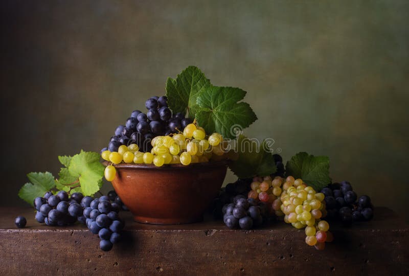 Still life with grapes stock image. Image of yellow - 109035235