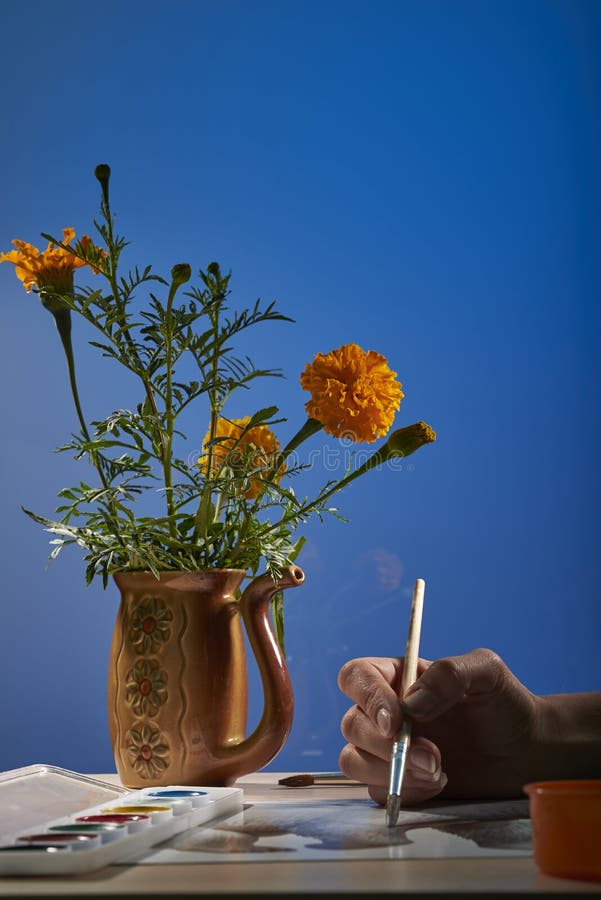 Still Life Hand Paints a Picture Stock Photo - Image of artists, blue ...