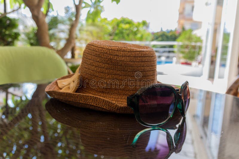 Still Life with Hat and Sun Glasses. Stock Image - Image of still ...