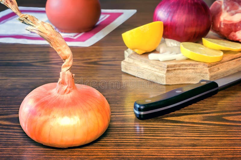 The Still Life: Large Onion and Lemon on the Table. Stock Photo - Image ...