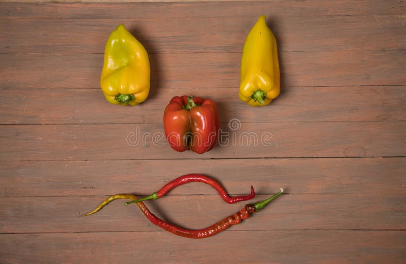 Still Life of Multicolored Peppers in the Form of a Human Face. Stock ...