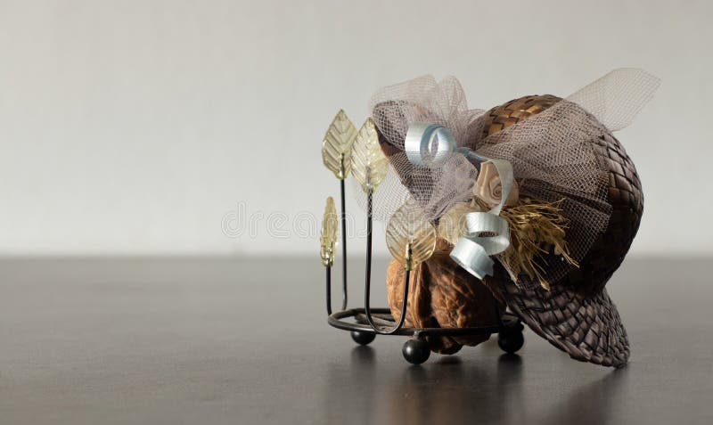 Still Life Photo with a Decorative Hat and Walnut Stock Photo - Image ...