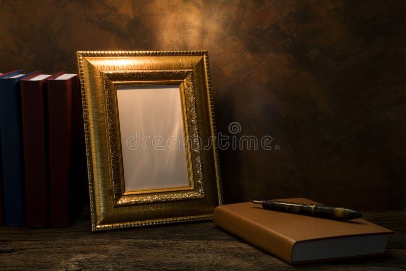 Still Life of Picture Frame on Table with Diary Book Stock Photo ...