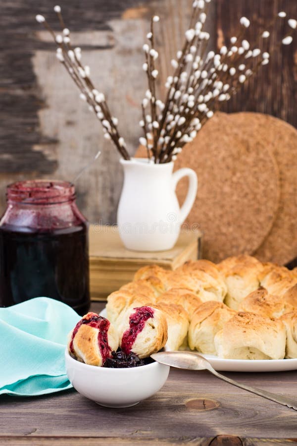 Still Life with Pieces of Monkey Bread and Berries Jam on a Wooden ...