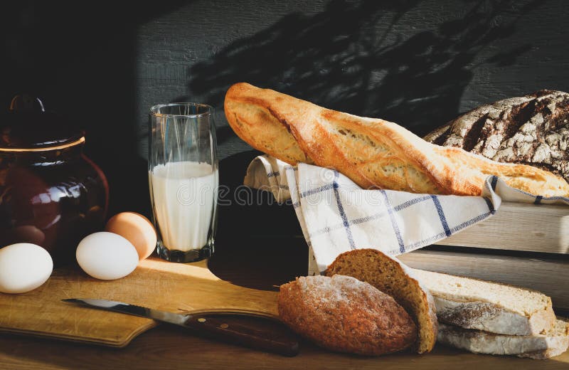 Still Life of a Rustic Breakfast, on a Wooden Table Homemade Bread ...