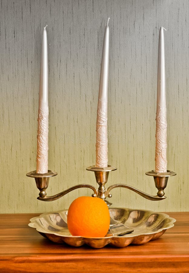 Still Life: Silver Candlestick and Orange Fruit Stock Photo - Image of ...