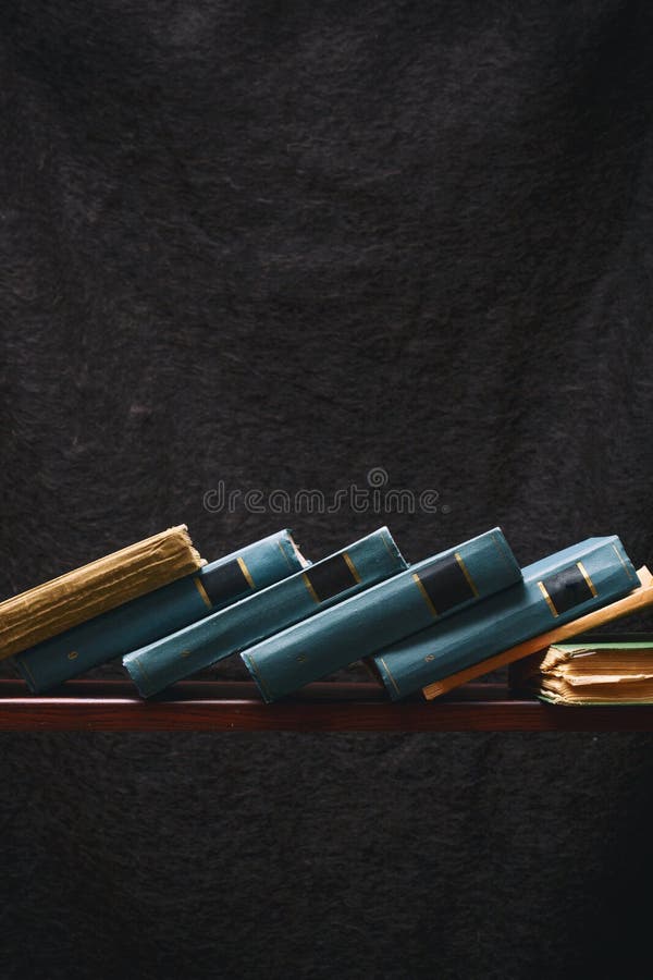 Still Life with a Stick of Old Books on the Shelf Stock Image - Image ...