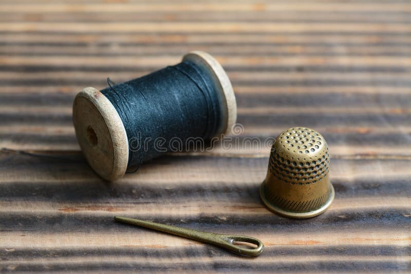 Still Life with Thread and Thimble Stock Photo - Image of bobbin ...