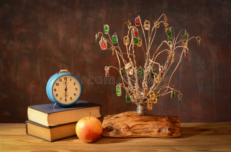 Still Life, Tree Made of Aluminum Wire, Books, Alarm Clock Stock Photo ...