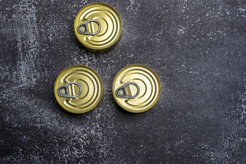 Still Life with Trio of Small Circular Metal Cans with Easy-open Tabs ...