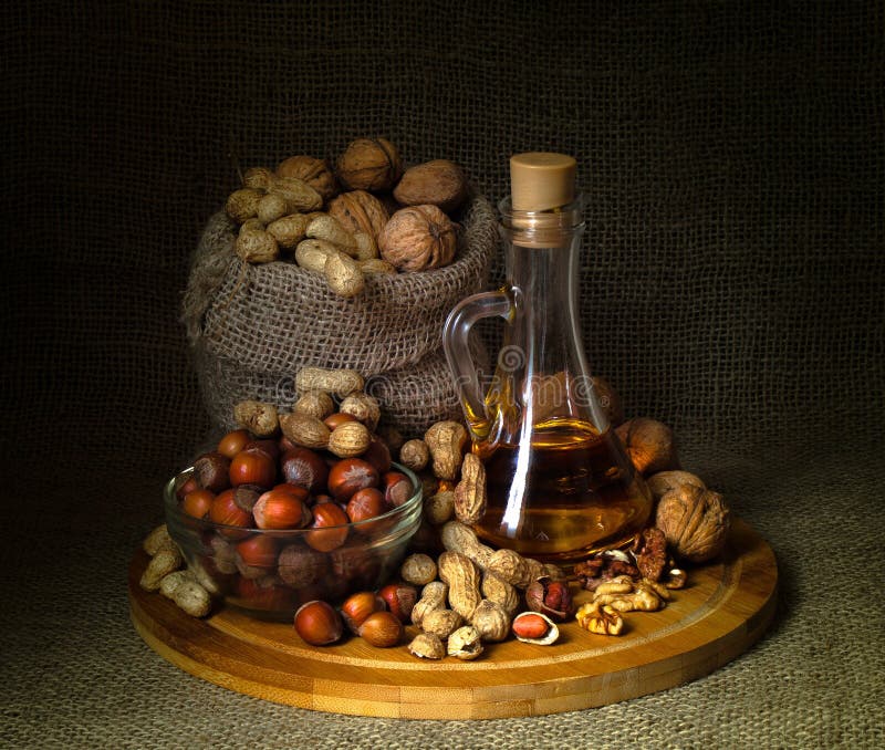 Still Life; Walnuts, Peanuts, Hazelnuts, Walnut Oil, on the Board Stock ...