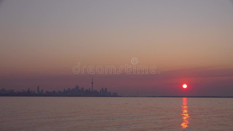 The Toronto Skyline Over Lake Ontario at Sunrise Stock Video - Video of ...