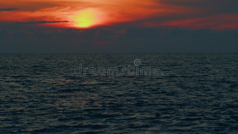 Water in Ocean with Sunset Reflected on Waves. View of Calm Waves ...