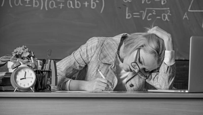 Work Far Beyond Actual School Day. Teacher Busy with Paperwork. Teacher ...